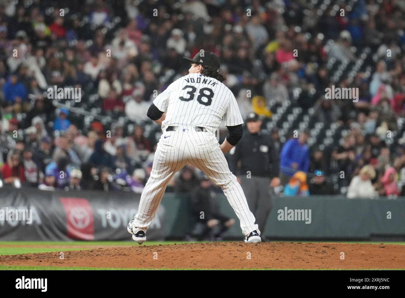 August 9 2024: Colorado pitcher Victor Vodnik (38) throws a pitch ...