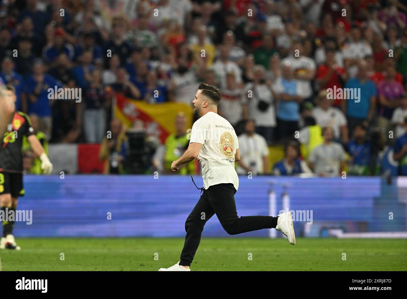 Pitch invader in action during the UEFA 2024 EUROÕs Semi final match ...