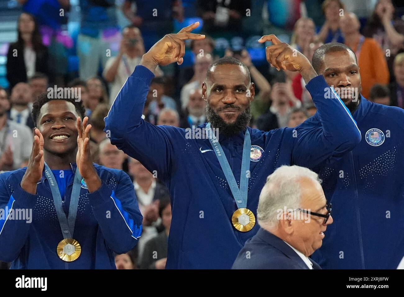 Paris, France. 11th Aug, 2024. Lebron James of the USA (6) holds up his ...
