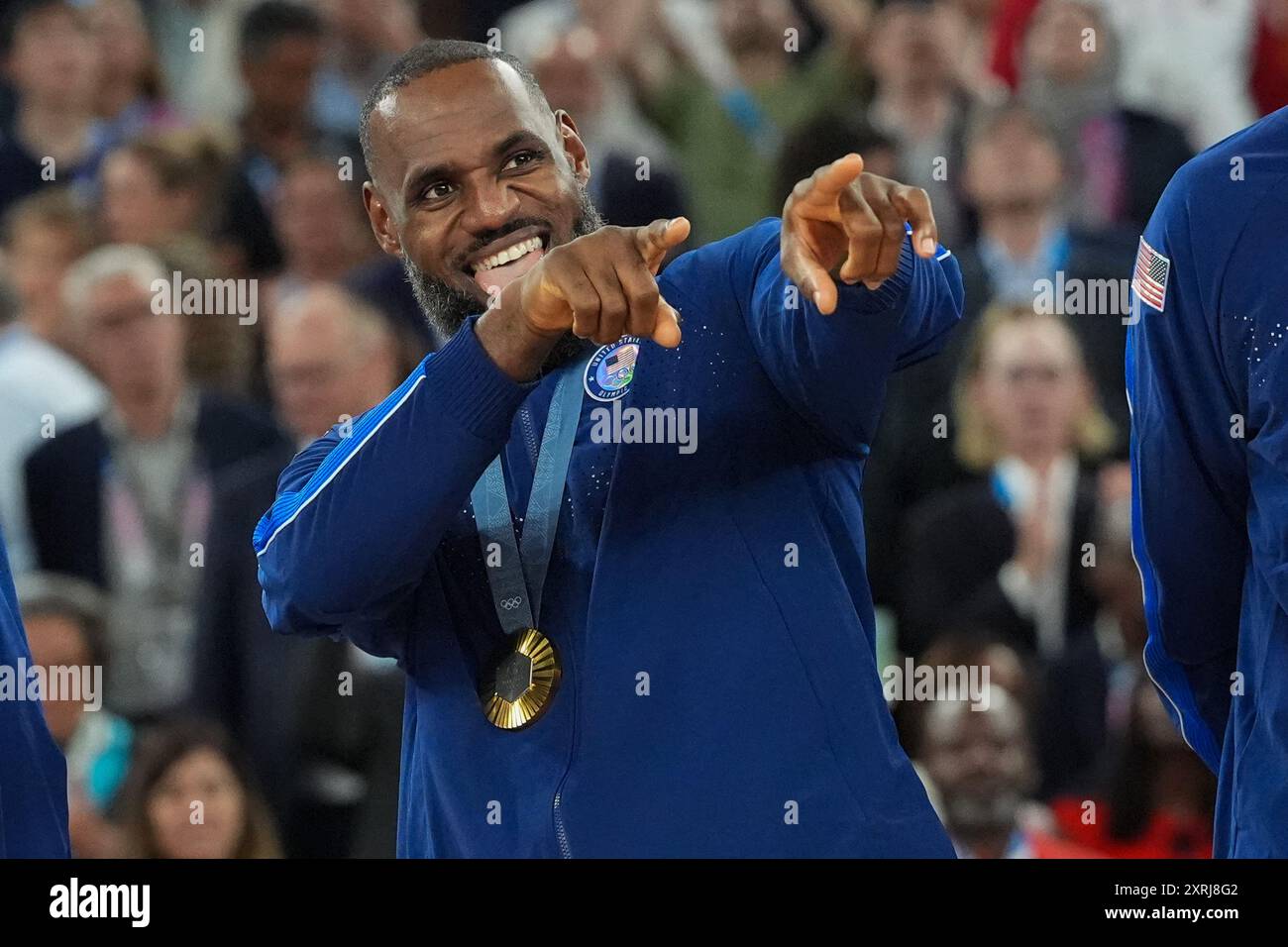 Lebron James of the USA (6) poses on the podium after team USA defeated ...