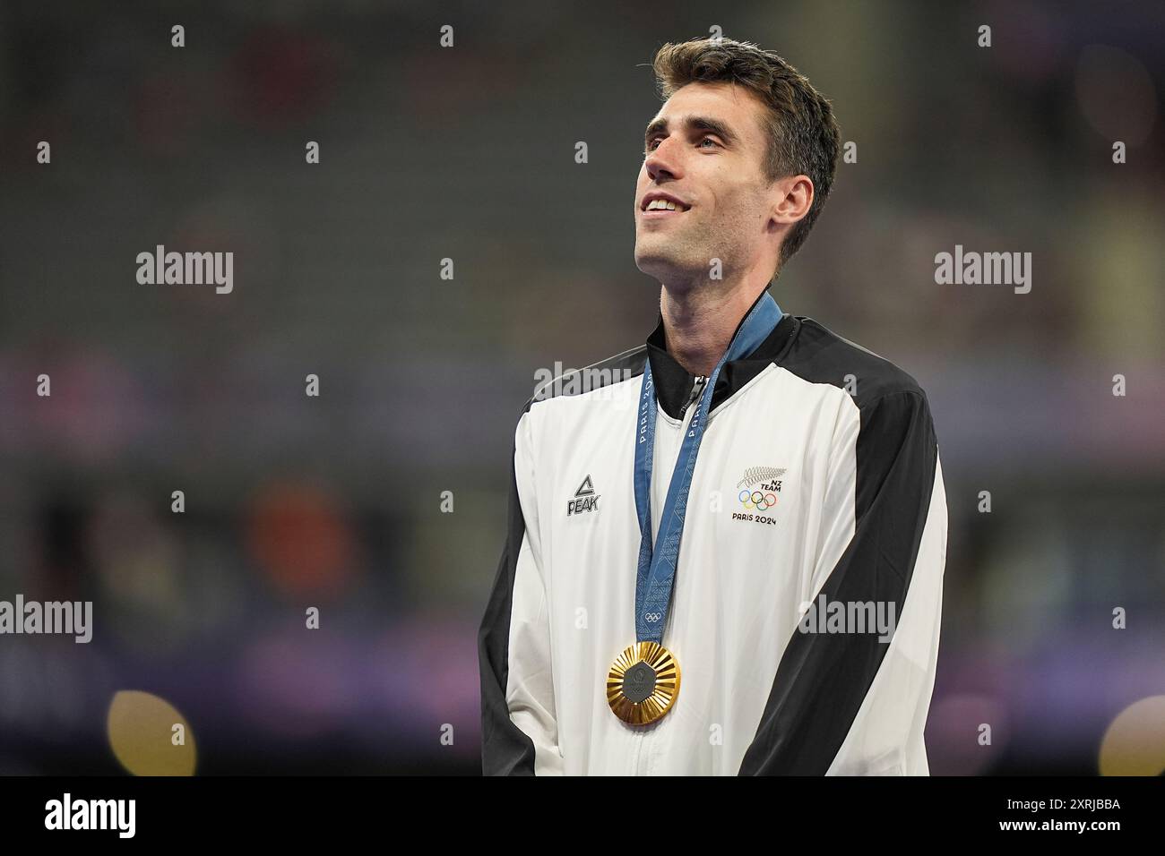 Gold medalist Hamish Kerr of New Zealand celebrates on the podium after ...