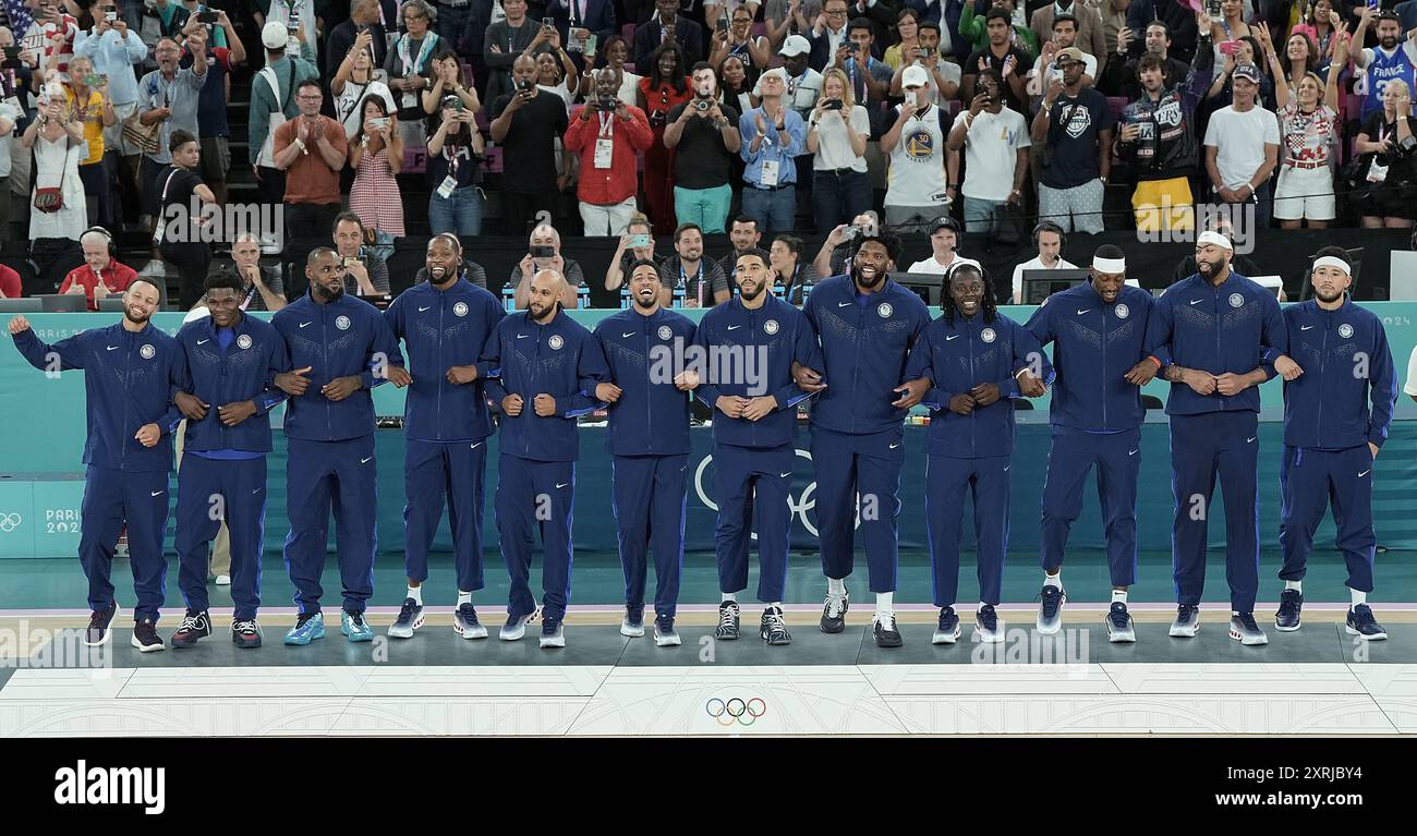Paris, France. 10th Aug, 2024. Gold medalists team USA react during the victory ceremony for the ...