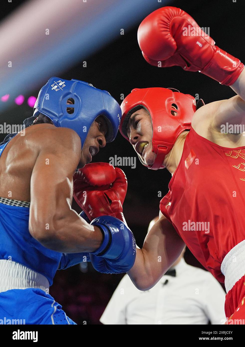 Paris, France. 10th Aug, 2024. Li Qian (in red) of China competes with ...