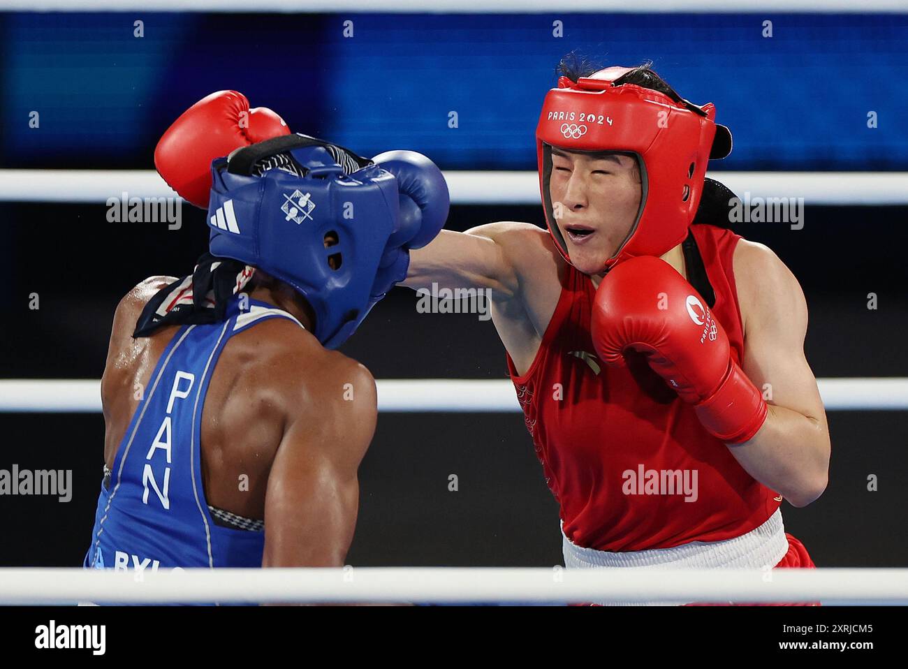 Paris, France. 10th Aug, 2024. Li Qian (in red) of China competes with ...