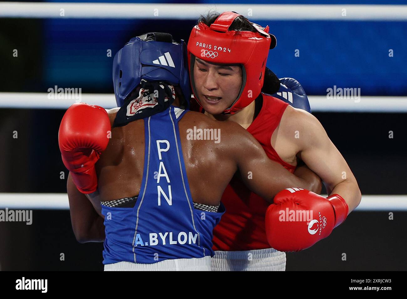 Paris, France. 10th Aug, 2024. Li Qian (in red) of China competes with ...