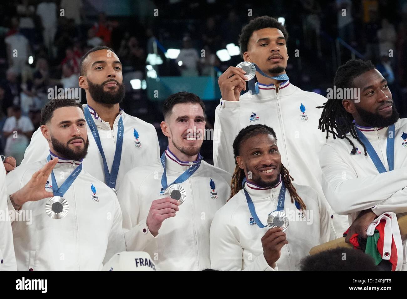 Team France pose with their silver medals after being defeated by team ...