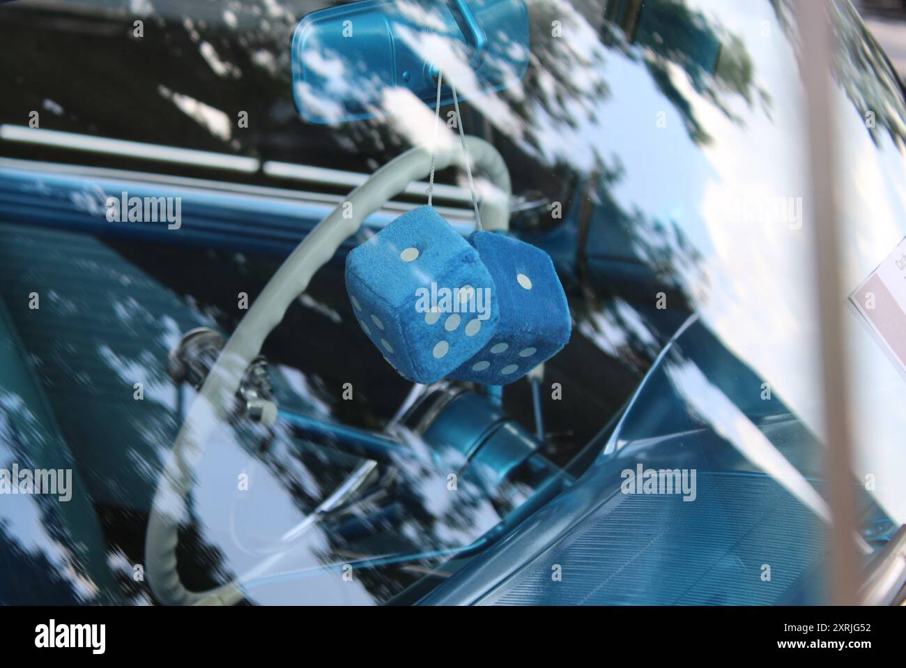 Fuzzy blue dice hi-res stock photography and images - Alamy