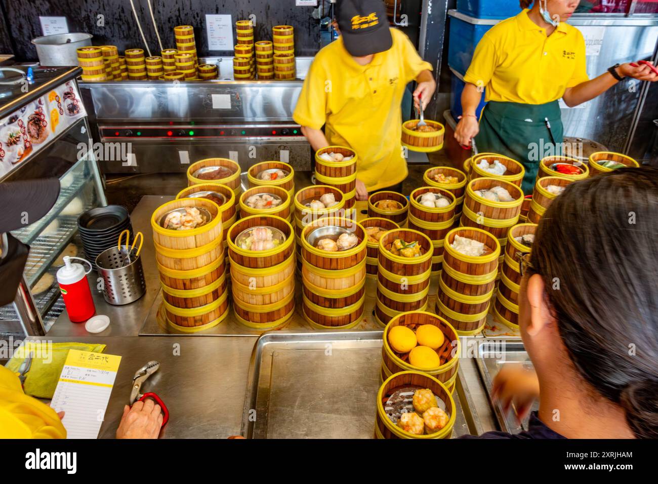 Steamer baskets containing dim sum, popular in south-eastern Asia, at ...
