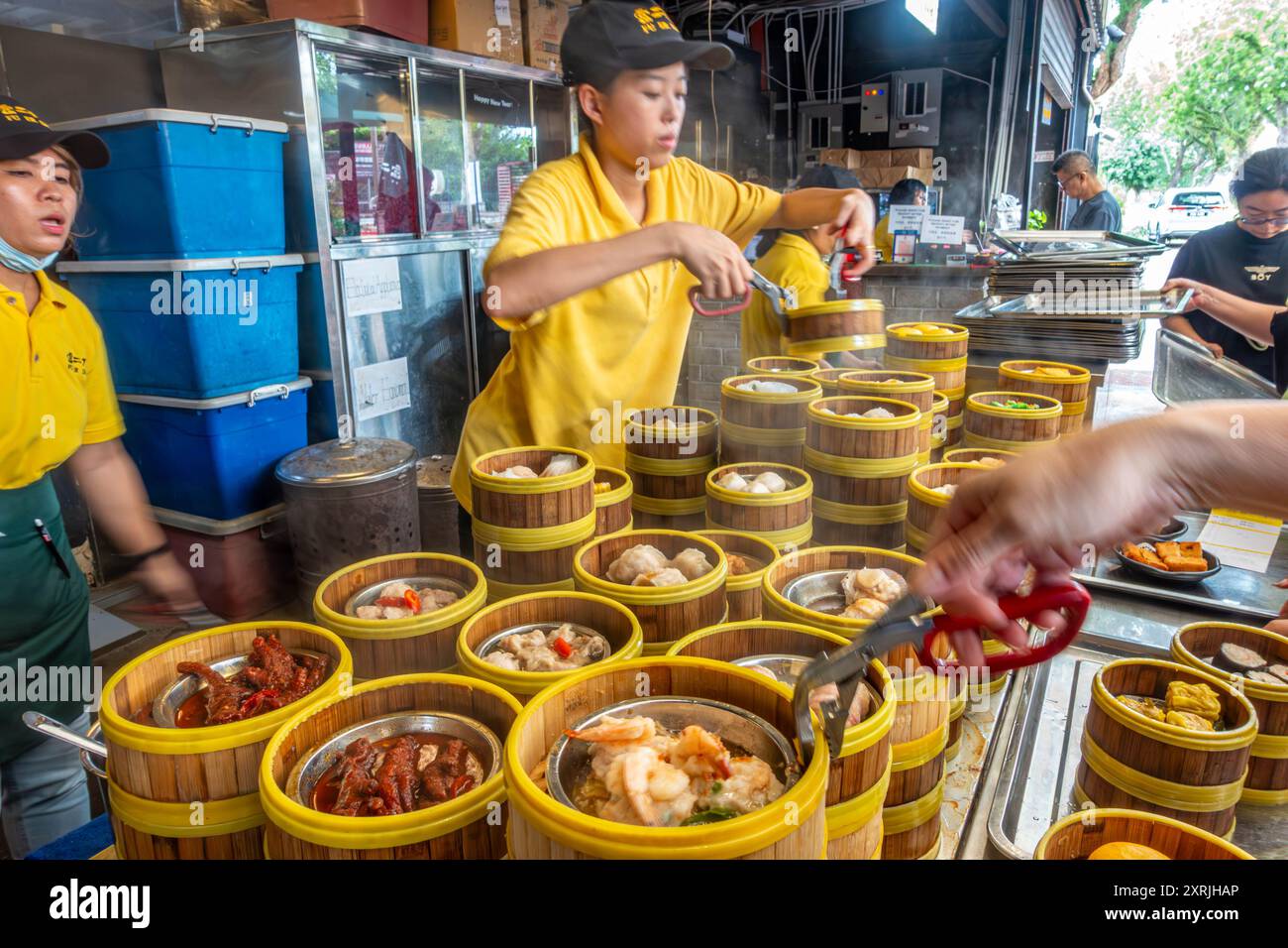 Steamer baskets containing dim sum, popular in south-eastern Asia, at ...