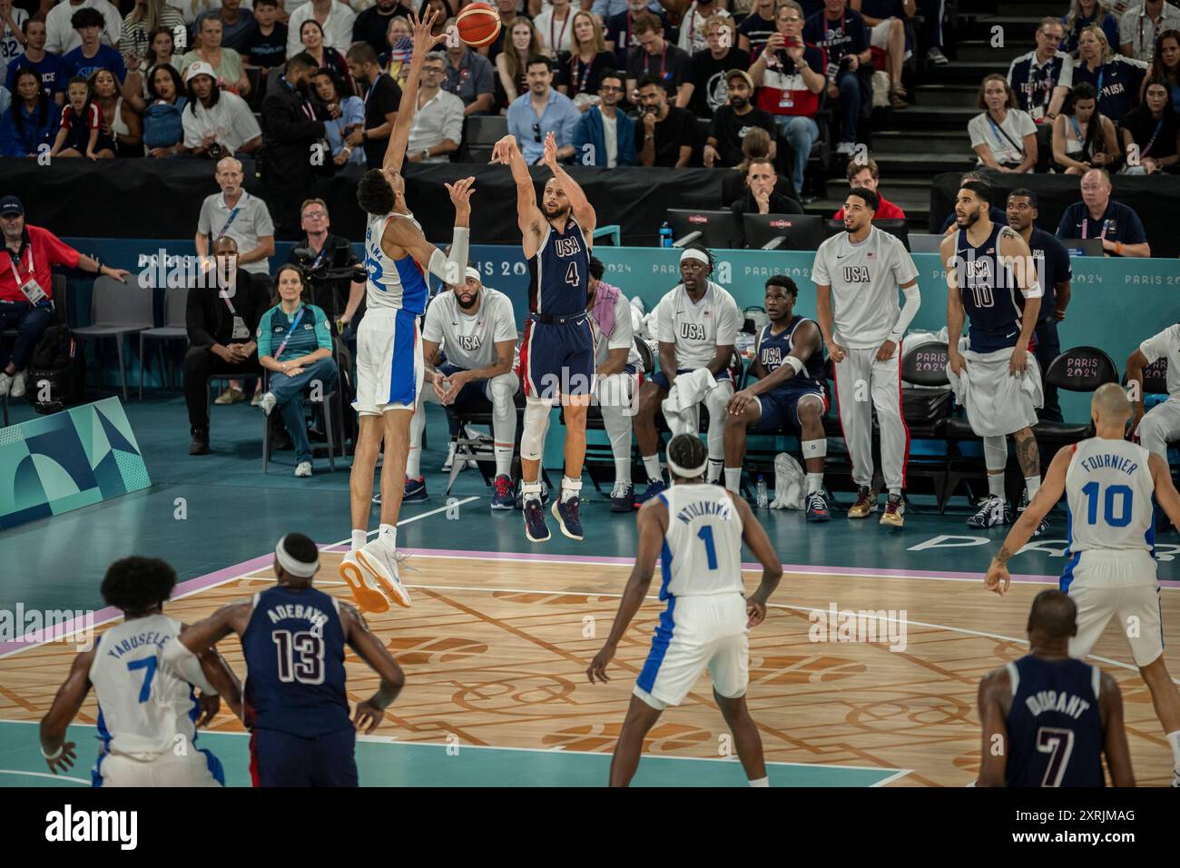 Paris, France. 10th Aug, 2024. Victor Wembanyama #32 and Stephen Curry ...