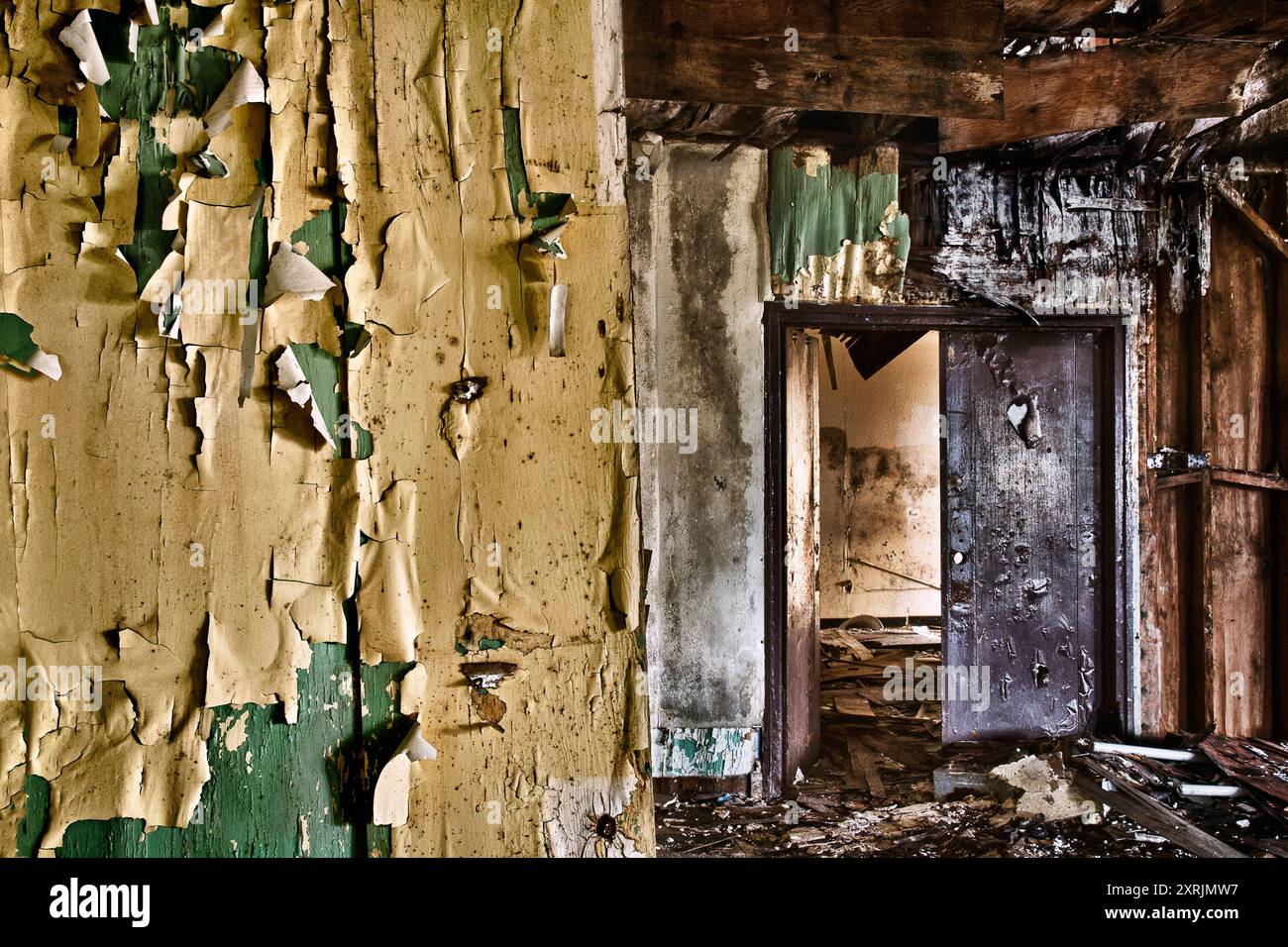 Peeling paint, crumbling walls, and a partially collapsed roof ...