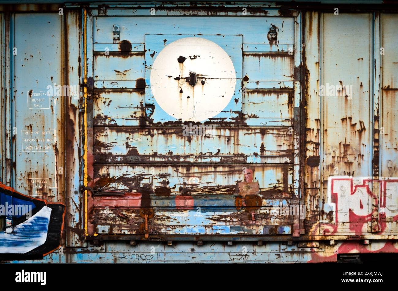 Old, abandoned and rusty railroad car, covered in graffiti. Bold ...