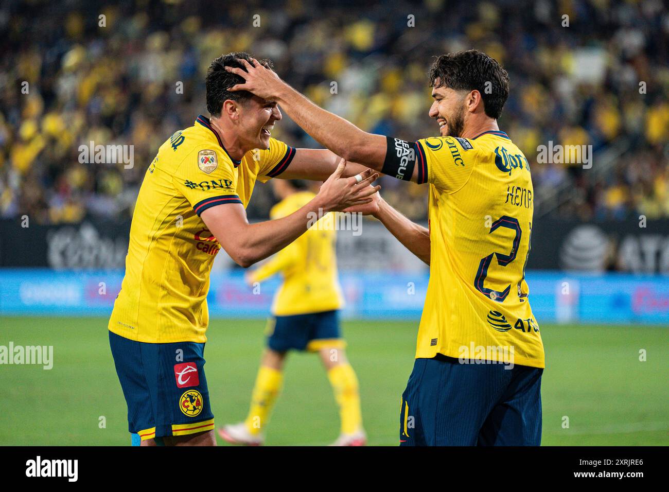 América forward Henry Martín (21) celebrates with defender Israel Reyes ...