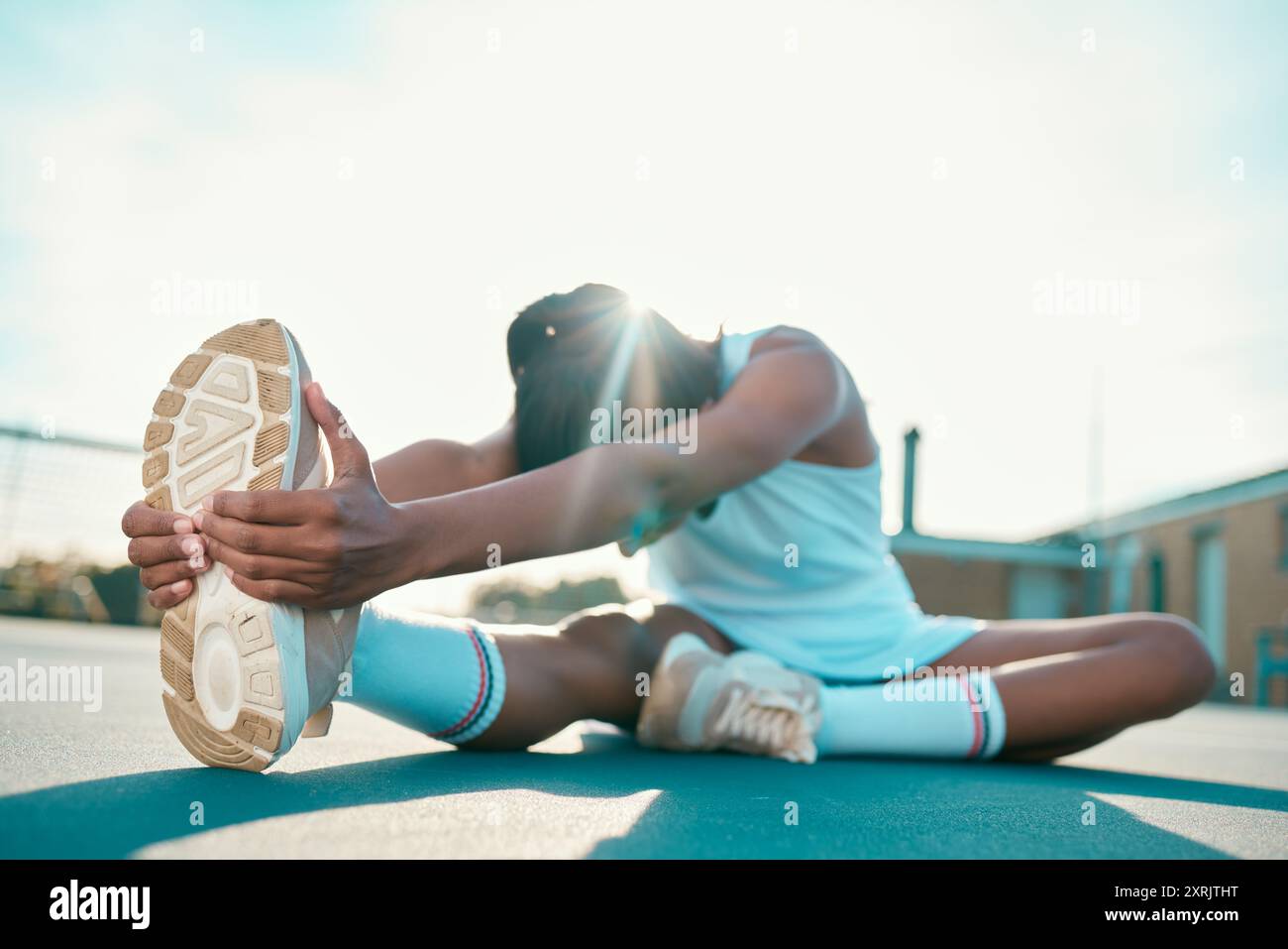 Tennis player, woman and stretching for fitness on court with leg warm ...