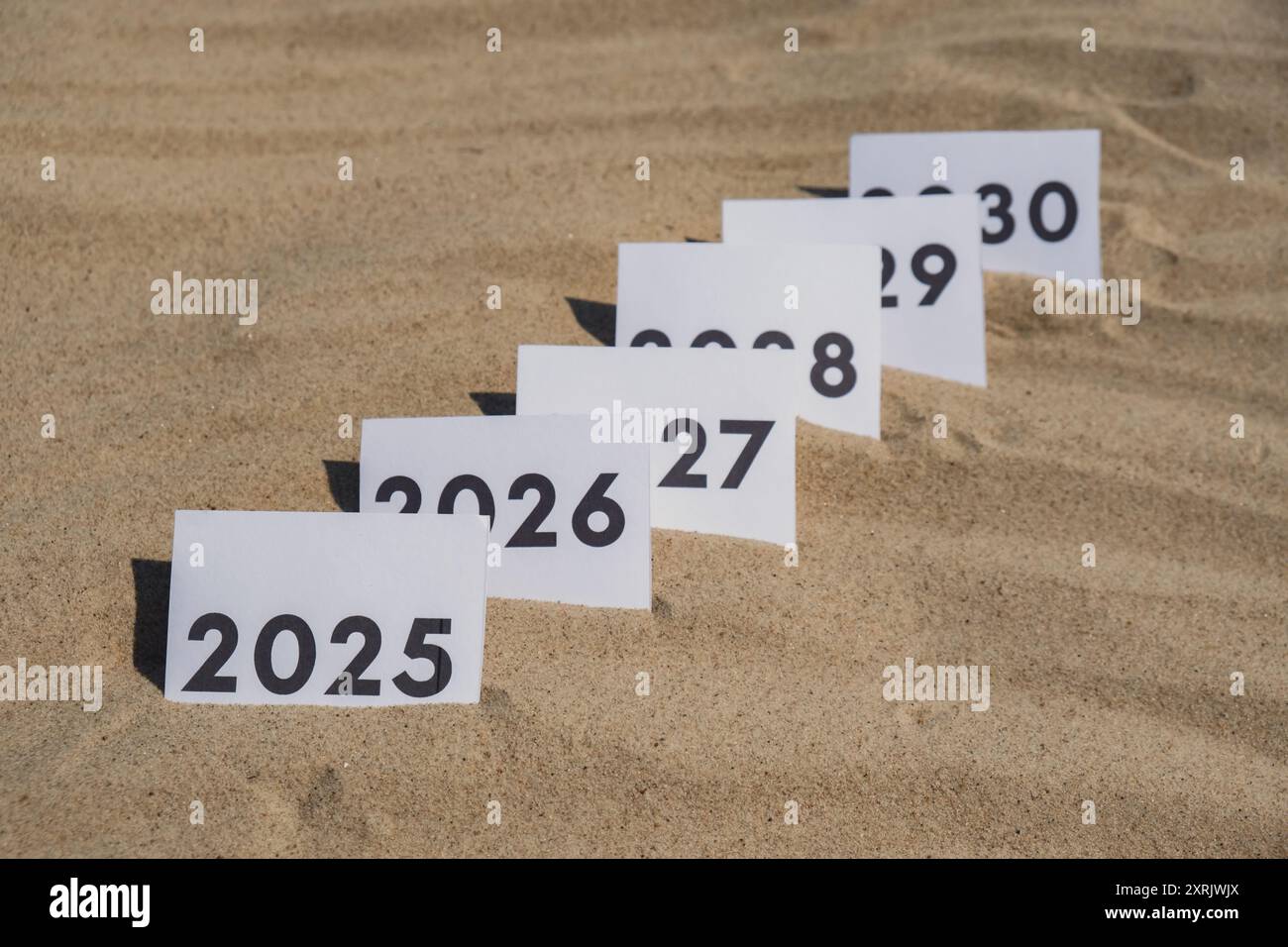 Paper cards with numbers of years from 2024 to 2030 in a row. New year ...