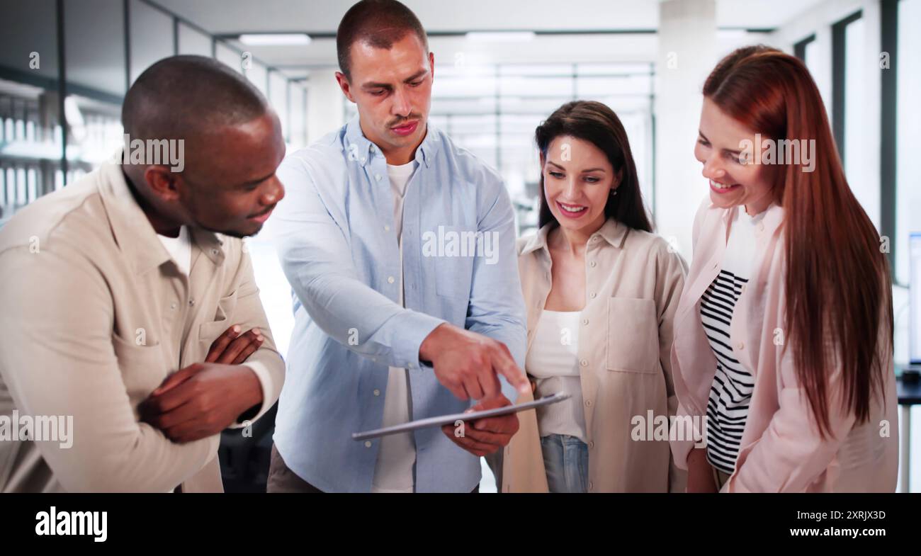 Business Team Using Tablet Technology. Standing Teamwork Stock Photo ...