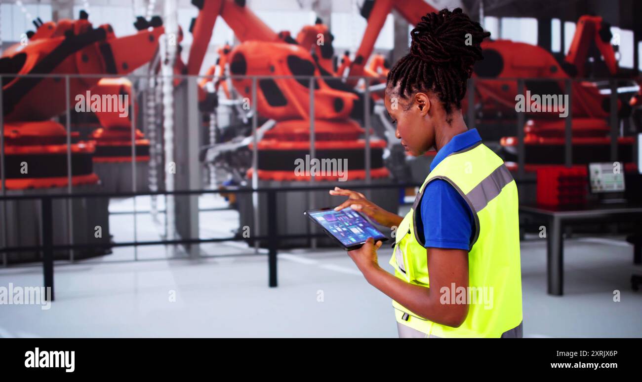 Worker In Automotive Car Factory Using Tablet Stock Photo - Alamy