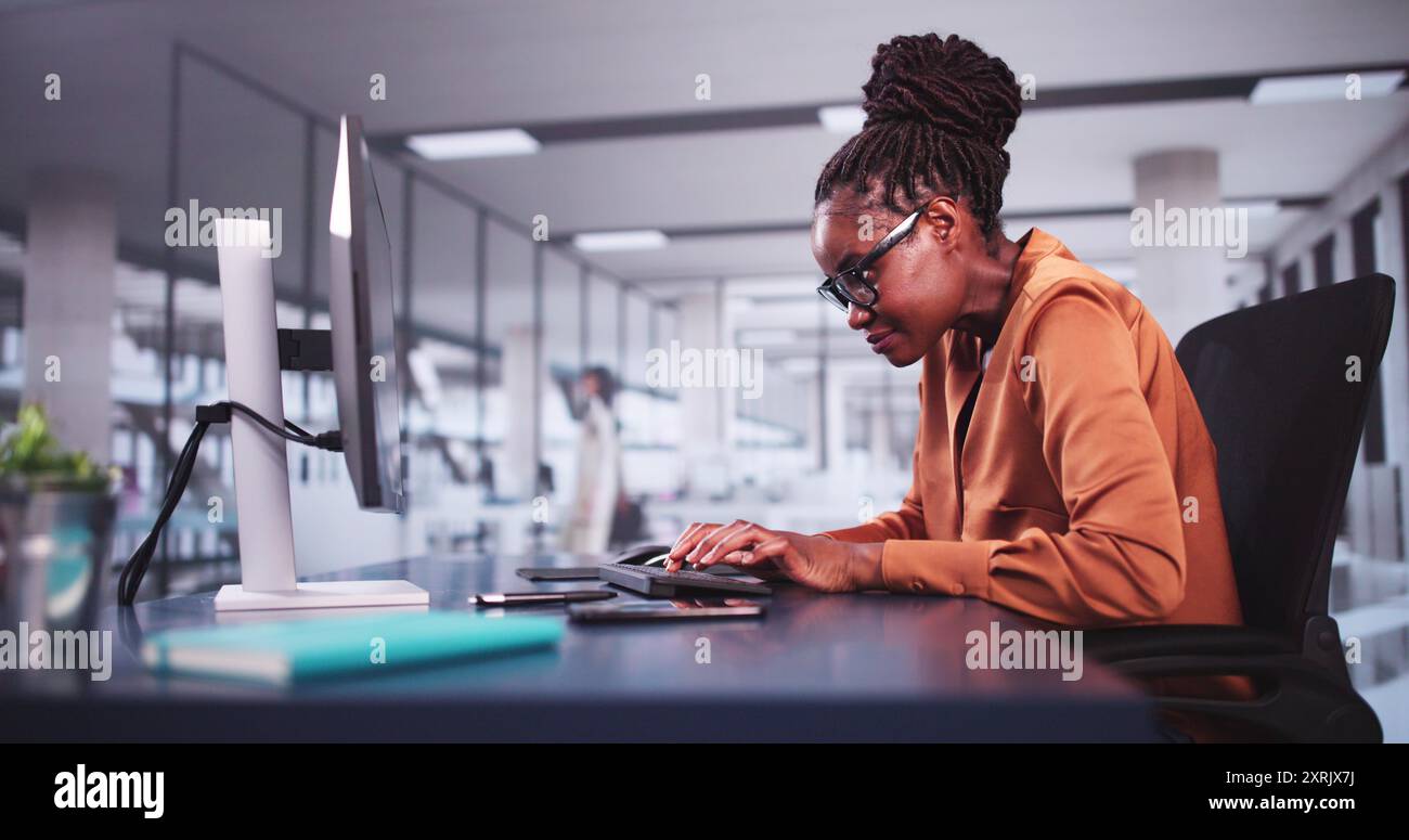 Poor african women working in computer hi-res stock photography and ...