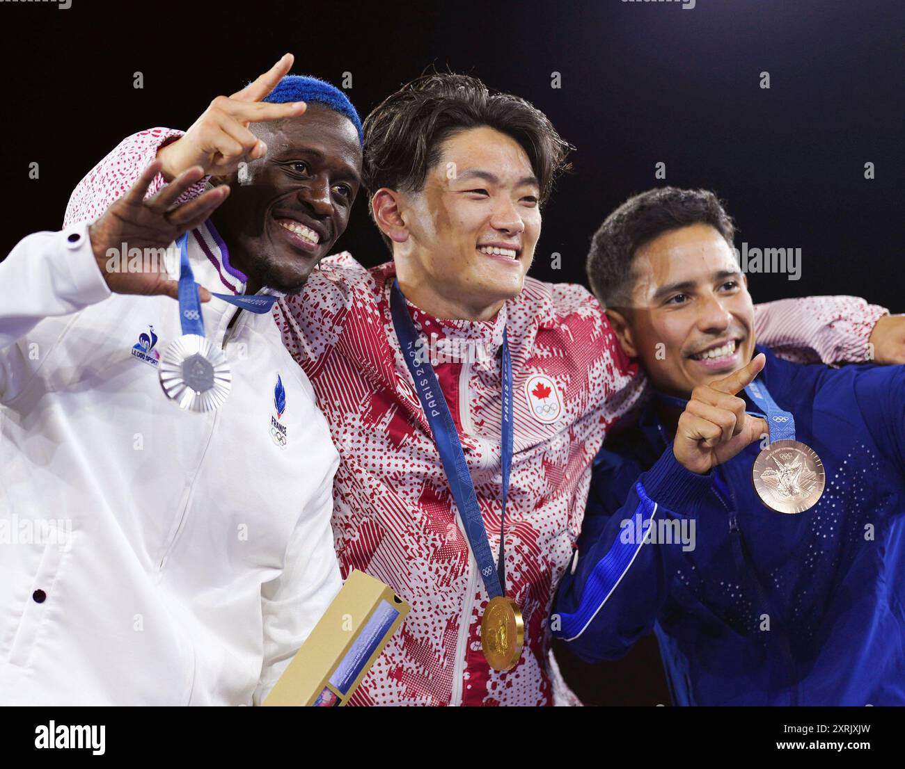 Paris on Aug. 10, 2024.Canada's Philip Kim (C), known as Phil Wizard ...