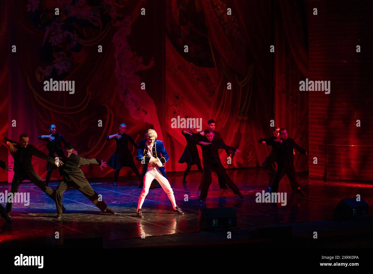 Actresses and actors acting and singing in the musical Stock Photo - Alamy