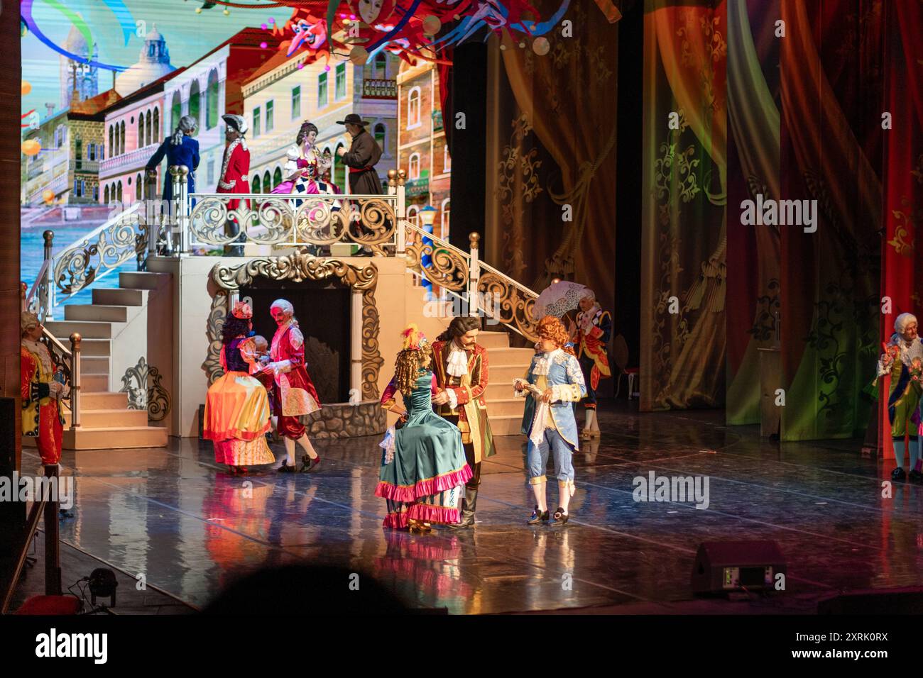 Actresses and actors acting and singing in the musical Stock Photo - Alamy