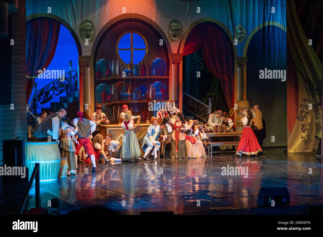 Actresses and actors acting and singing in the musical Stock Photo - Alamy