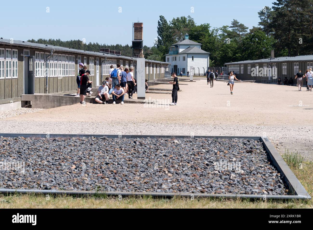 The Main gate or Guard Tower A and two of five infirmary barrack of ...