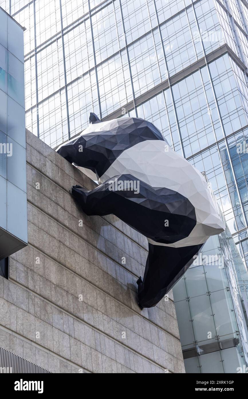 Closeup of Giant Panda clinging onto the IFS Mall building in Chengdu ...