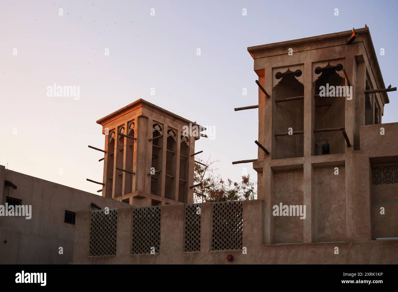 Historic wind tower in Al Fahidi, an old Dubai area, demonstrating ...