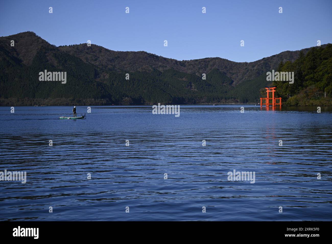 Landscape with scenic view of Hakone-jinja shrine red torii gate a ...