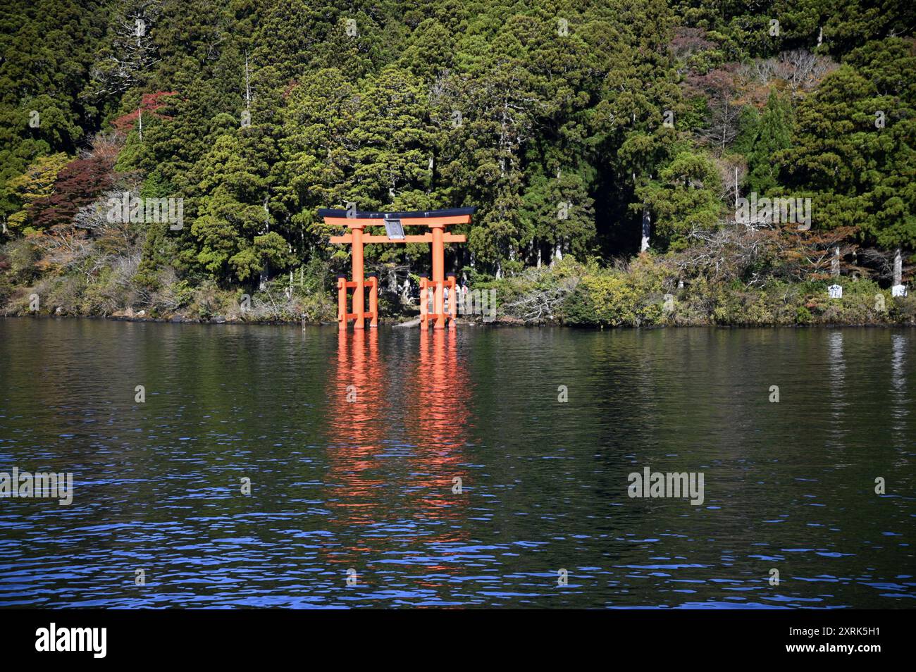 Landscape with scenic view of Hakone-jinja shrine red torii gate a ...