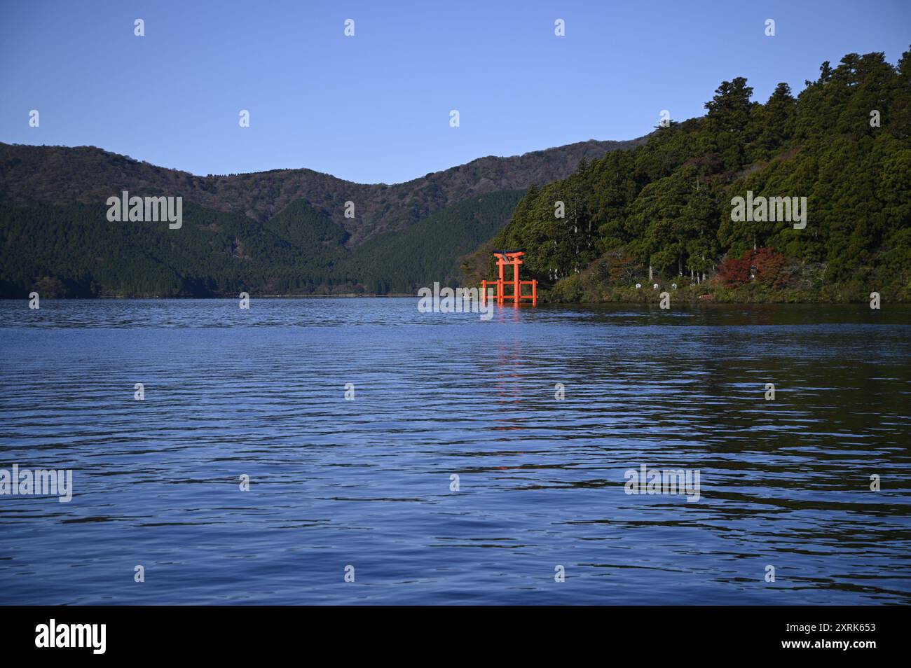 Landscape with scenic view of Hakone-jinja shrine red torii gate a ...