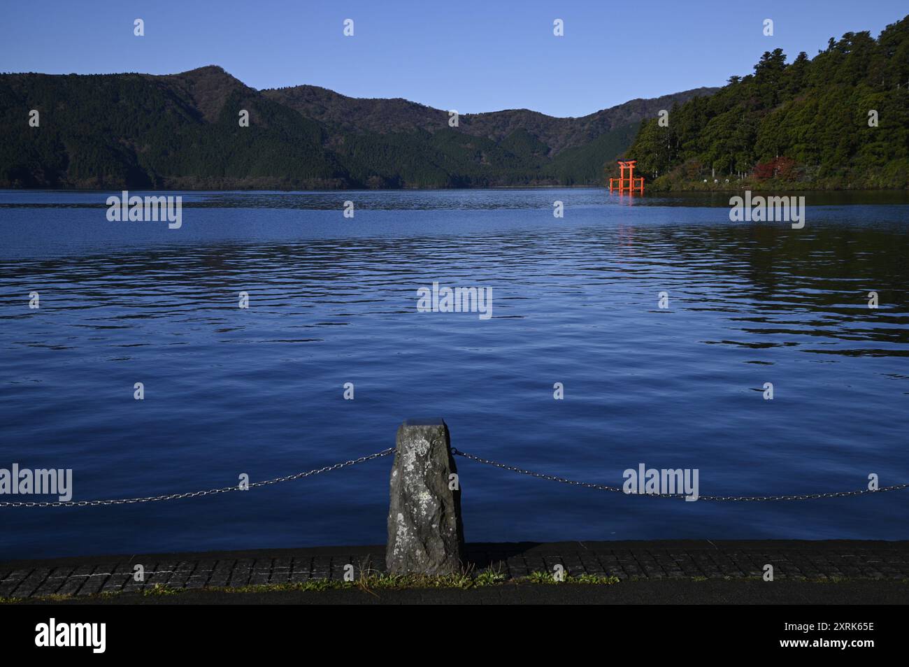 Landscape with scenic view of Hakone-jinja shrine red torii gate a ...