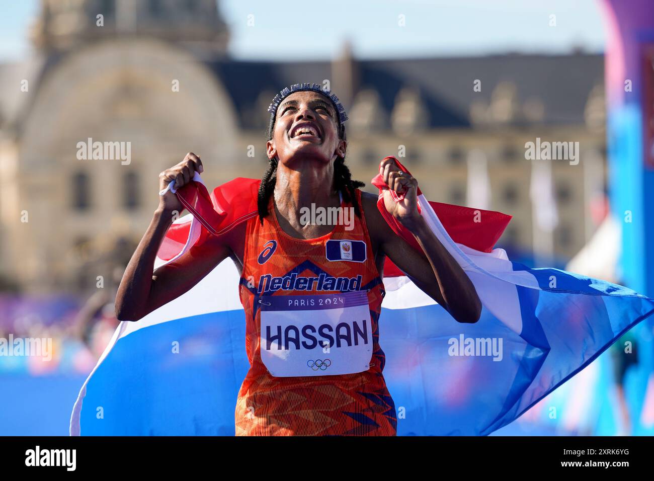 Sifan Hassan, of the Netherlands, celebrates after crossing the finish ...