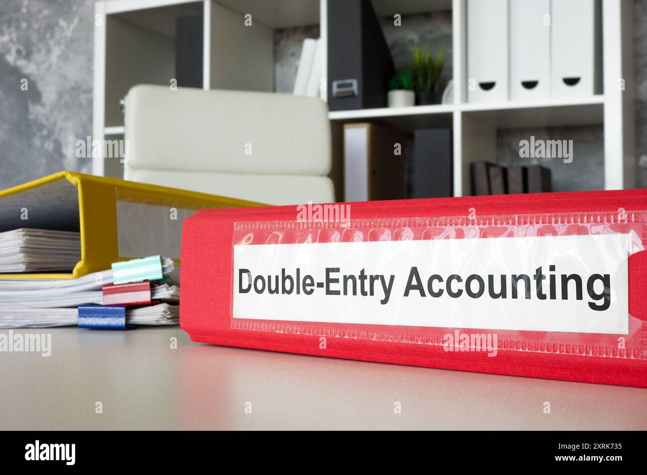 Double-entry accounting folder on an office desk. Accurate financial ...
