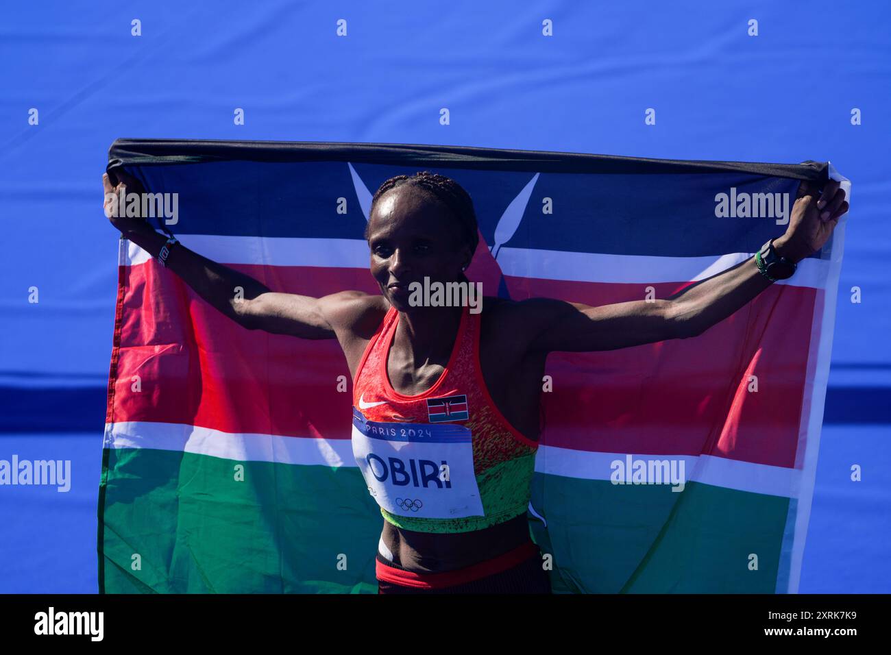 Kenya's Hellen Obiri celebrates after crossing the finish line to win ...