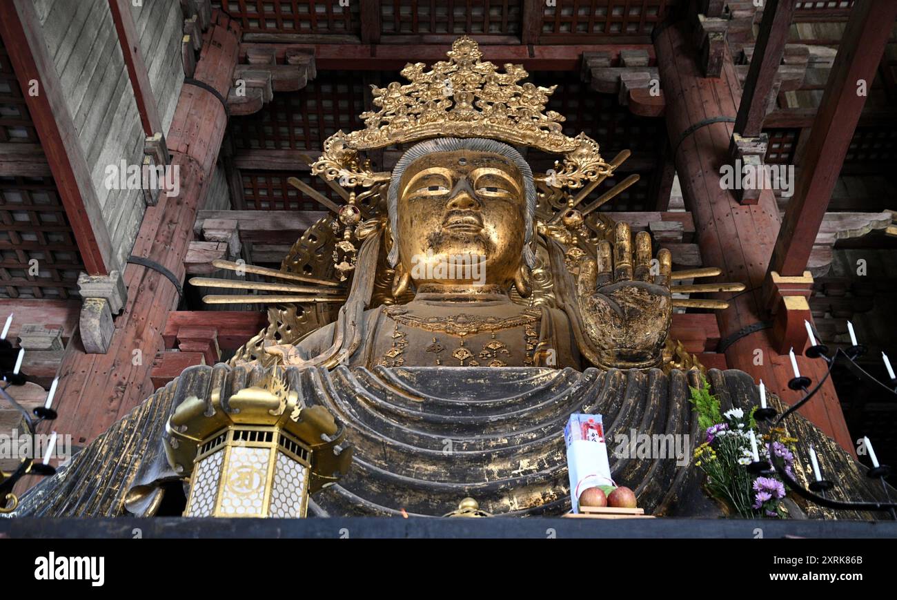 Golden statue of Goddess Nyoirin Kannon in the Main Great Buddha Hall ...