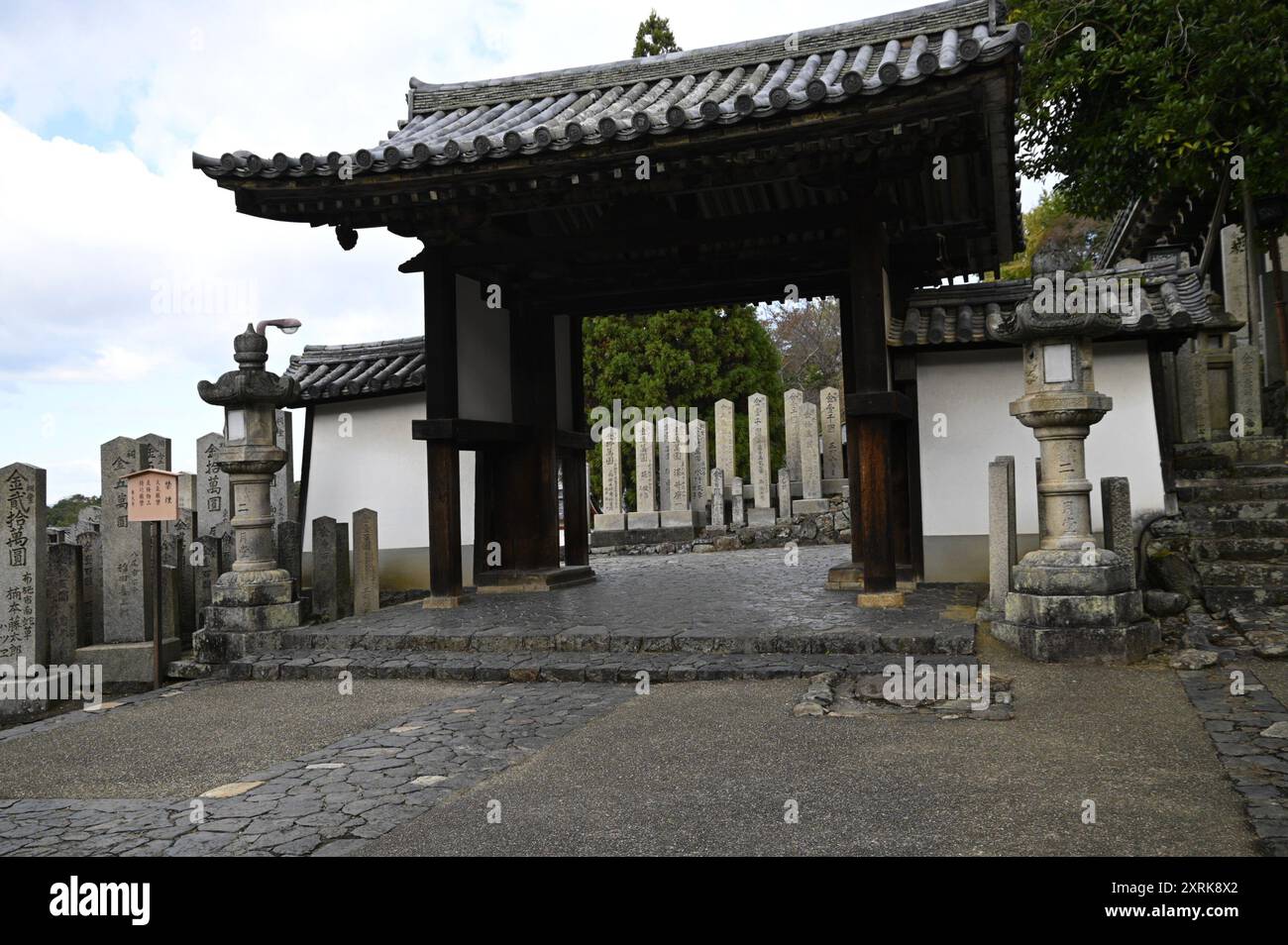 Landscape with scenic view of stone lanterns and gravestones on the ...