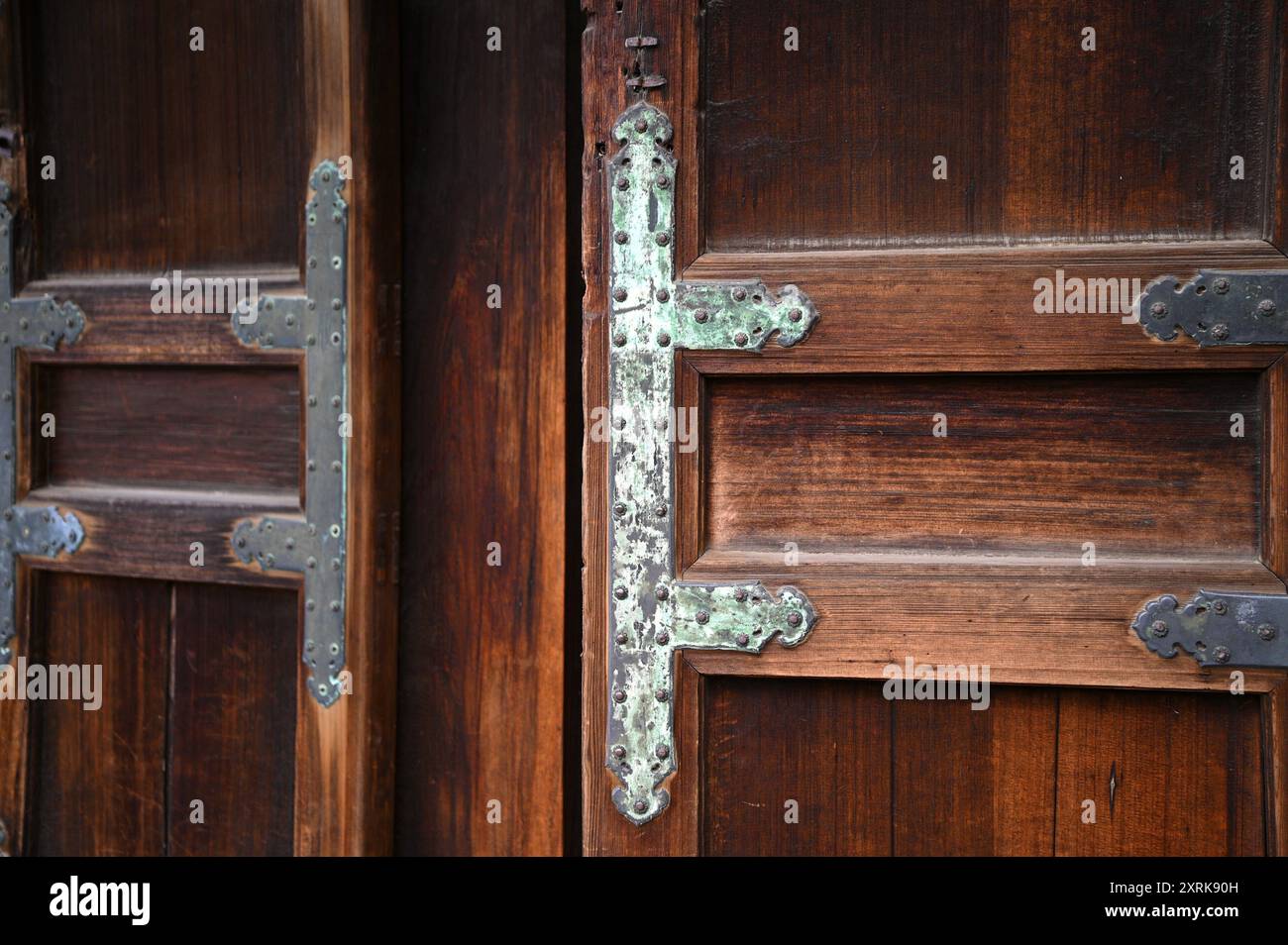 Antique Japanese cedar wooden entrance door with vintage bronze hinges ...