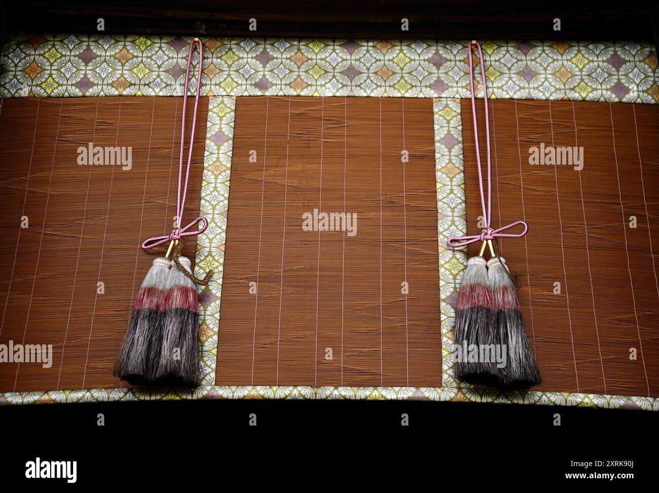 Traditional Japanese Fusuma door with two handmade pendant lucky charms ...