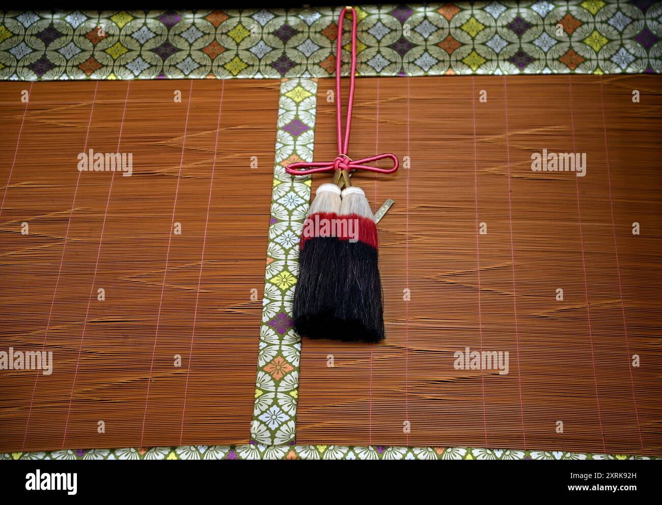 Traditional Japanese Fusuma door with a handmade pendant lucky charm in ...