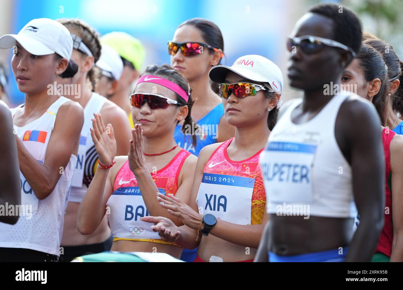 Paris, France. 11th Aug, 2024. Bai Li (2nd L) and Xia Yuyu (2nd R) of ...