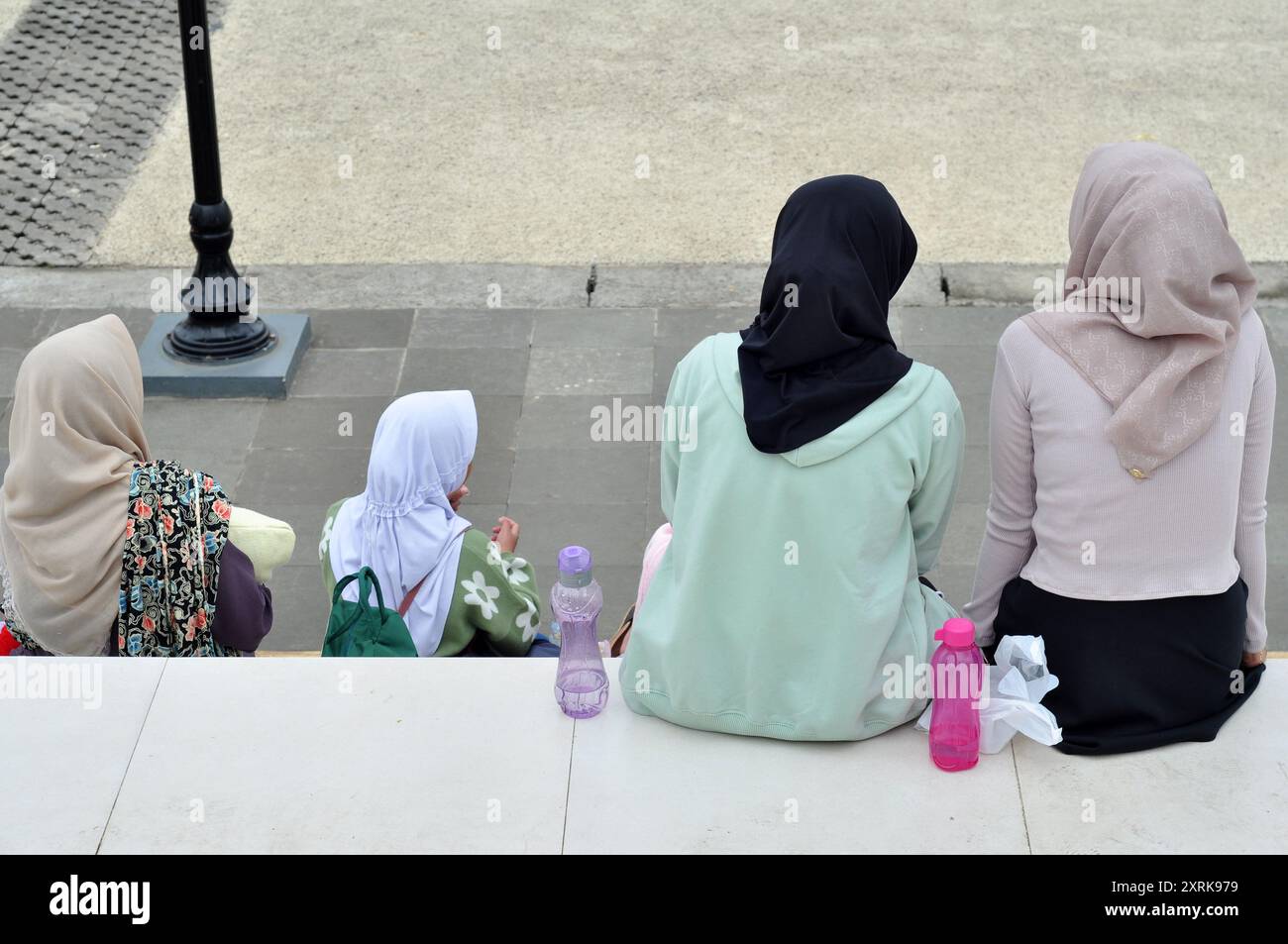 West Java, Indonesia - August 11, 2024 : Four women wearing hijabs are ...