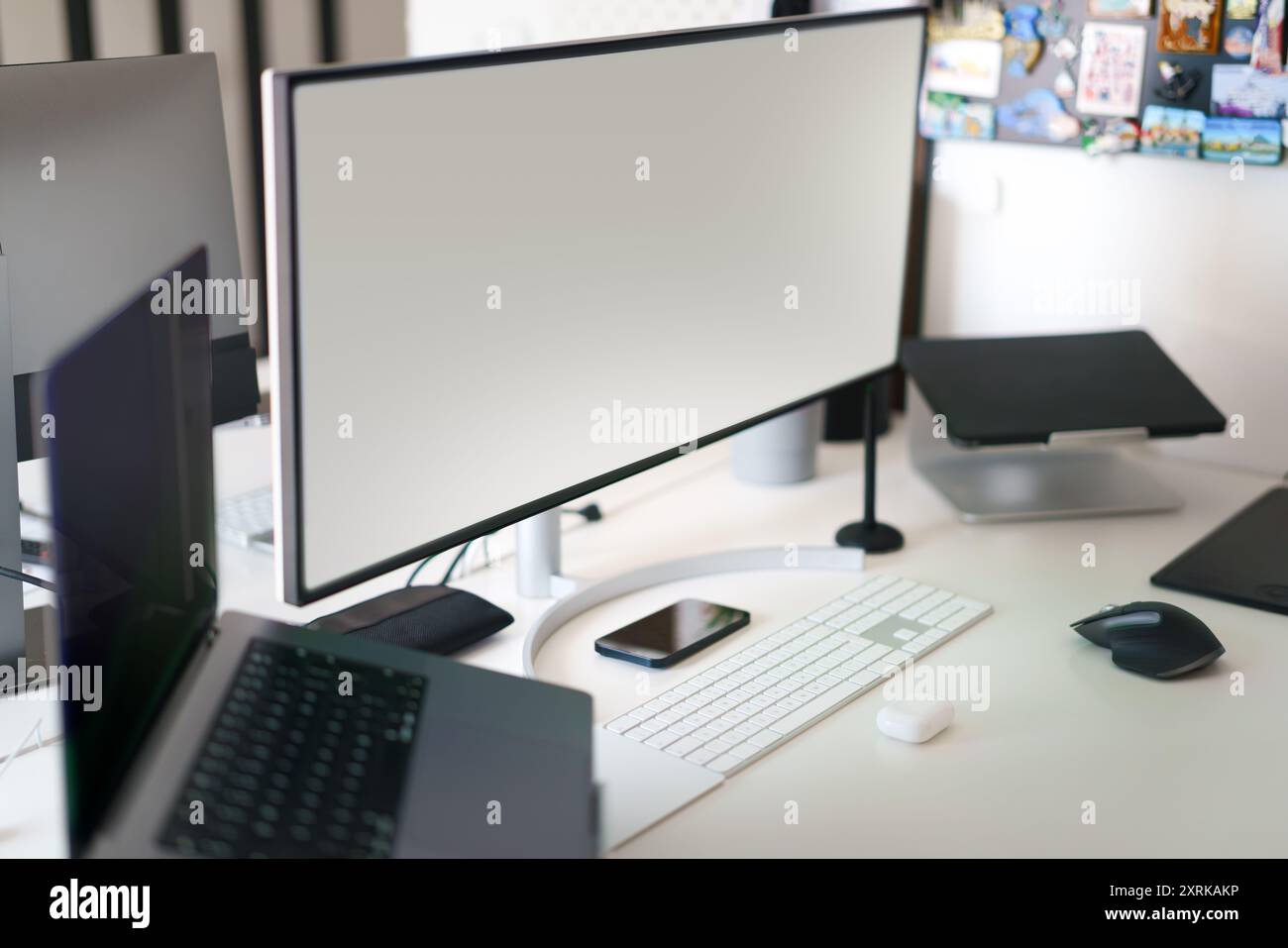 Empty computer monitors. Screen mockup. Home office studio. Workplace ...