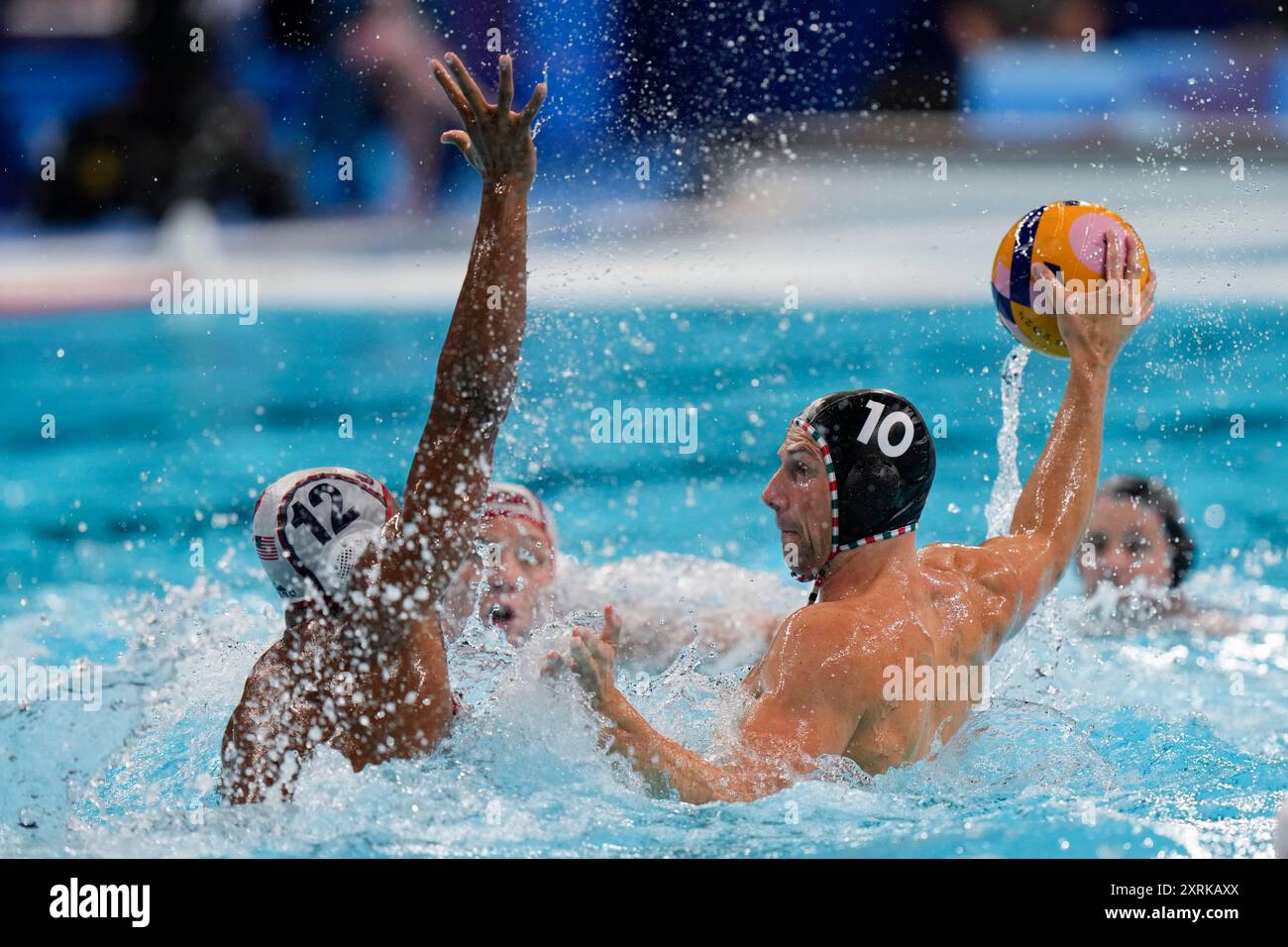 United States' Max Irving, left, tries to block Hungary's Denes Varga ...