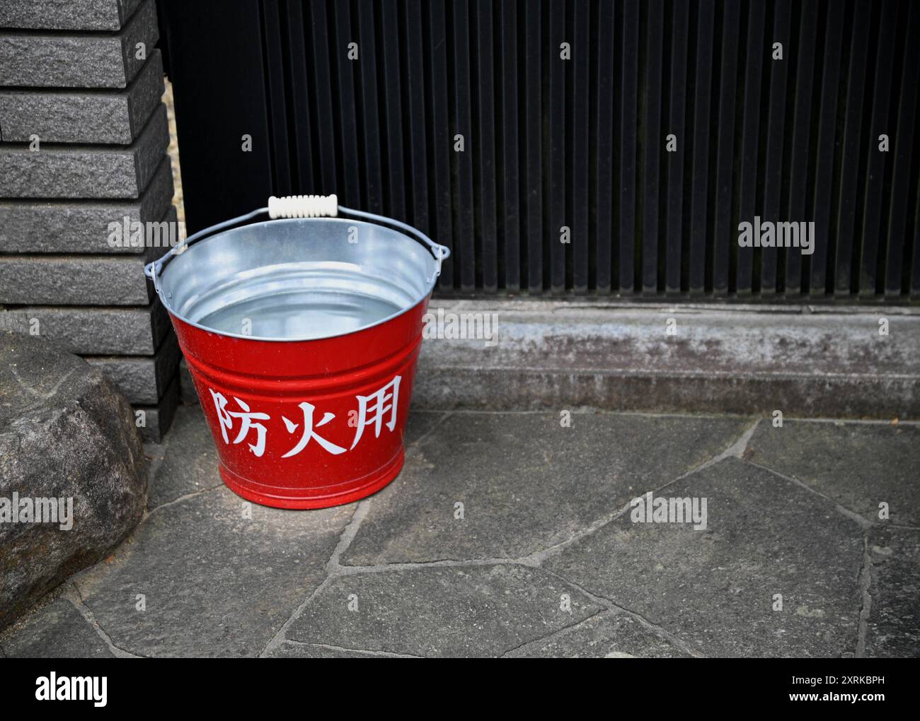 Traditional Japanese red galvanized iron fire bucket in Nara Kansai ...