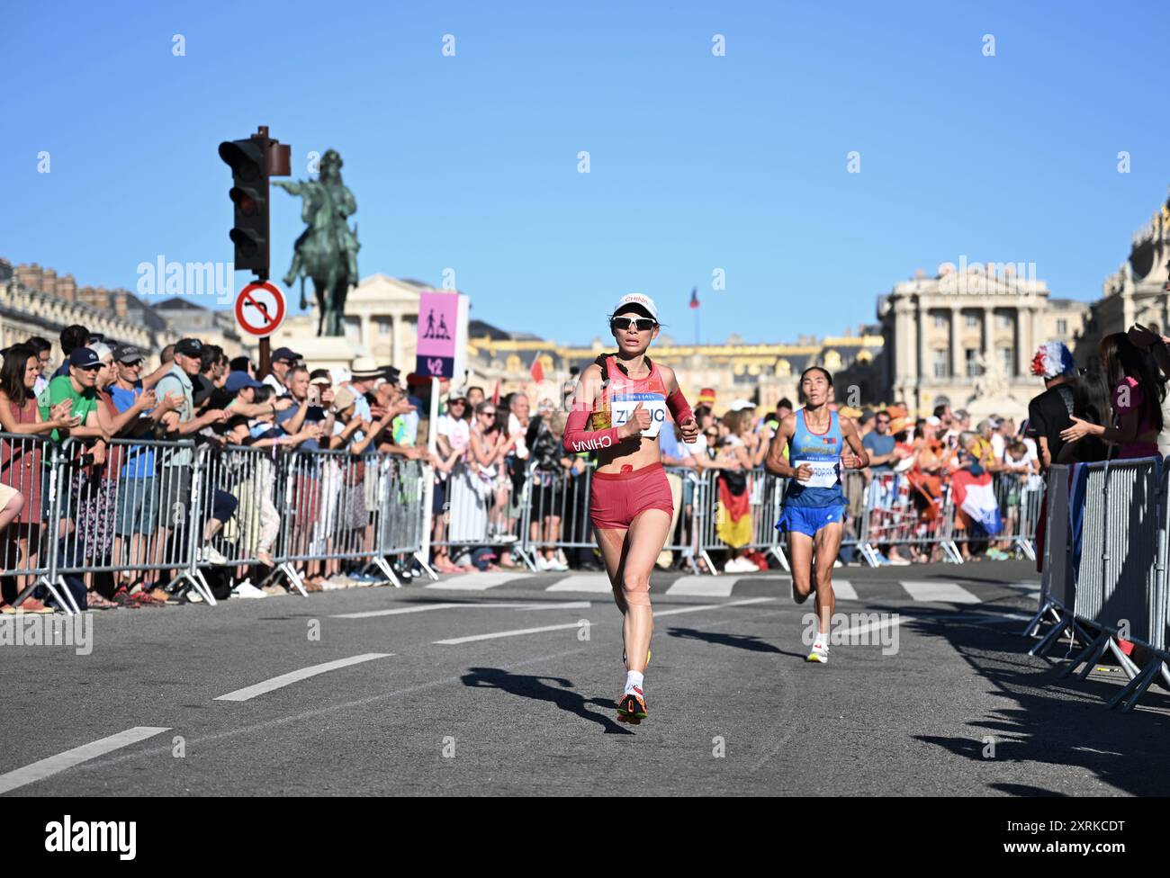 Paris, France. 11th Aug, 2024. Zhang Deshun (front) of China competes ...