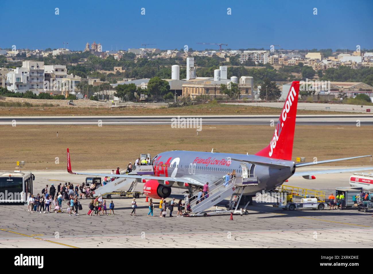 Luqa, Malta - 7 August 2023: Passengers boarding a Boeing 737 holiday ...