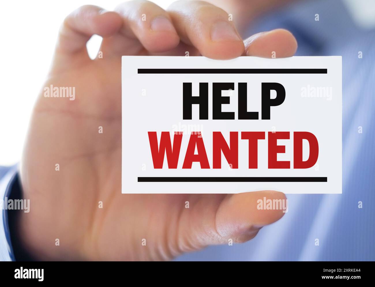 Help Wanted - message written on business card Stock Photo - Alamy