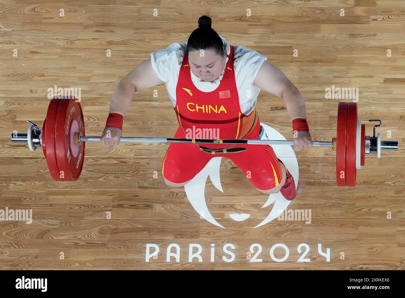 Li Wenwen of China competes during the women's +81kg weightlifting ...